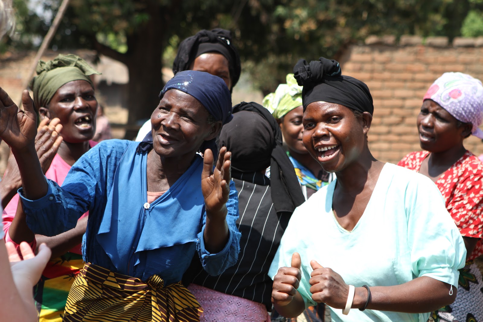 Loomi's mind: Malawian women welcoming us to Chitama Village