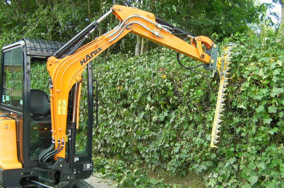 FarmerHelper: Front Loader & Skidder Mounted Land-clearing Hedge Cutter