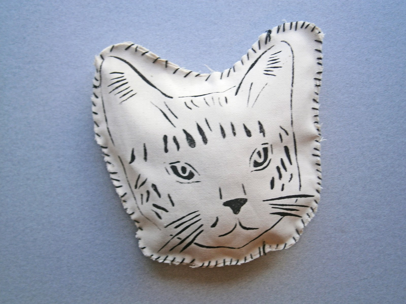 .: How to make an upcycled toy cushion for your cat