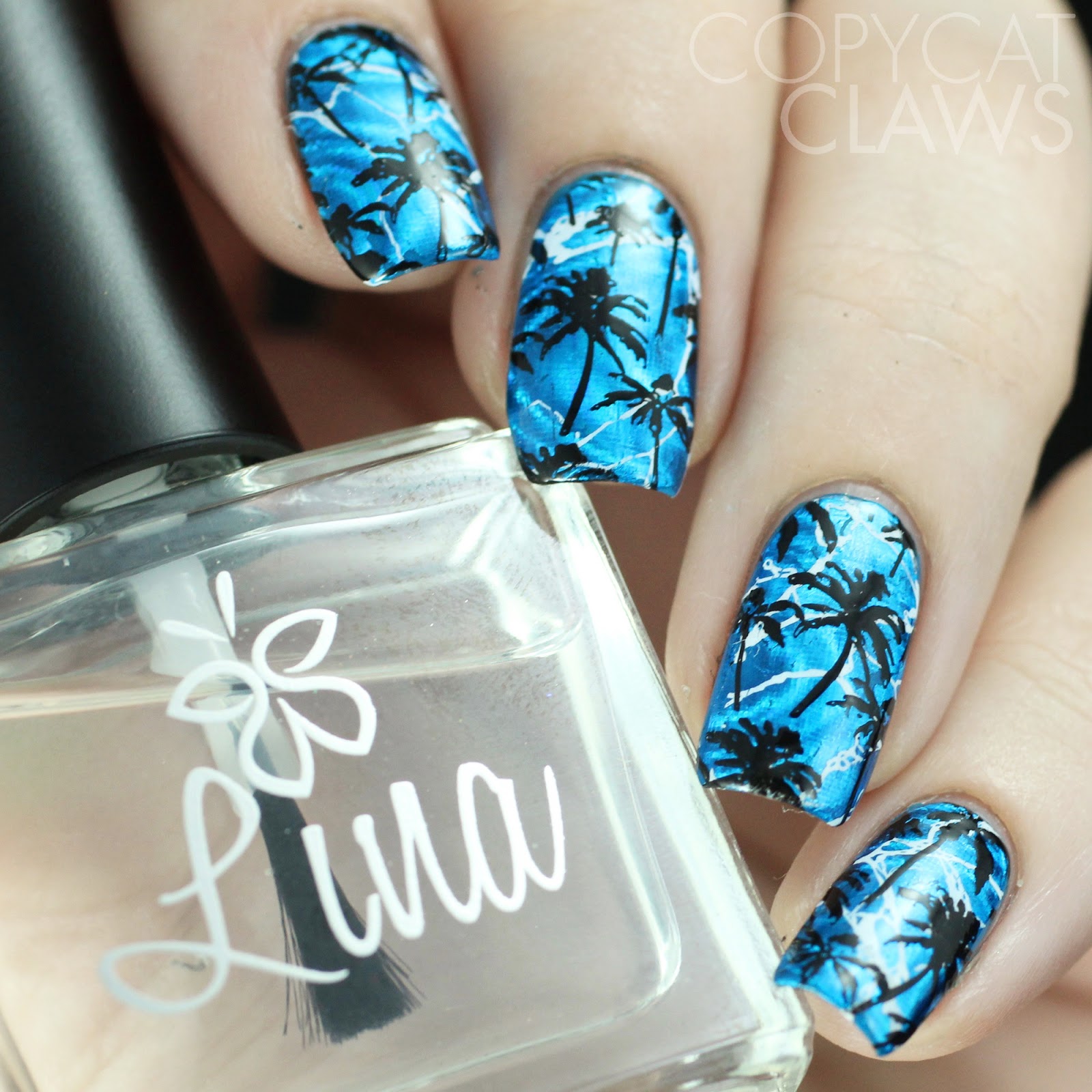 White And Blue Pom Tree Nails