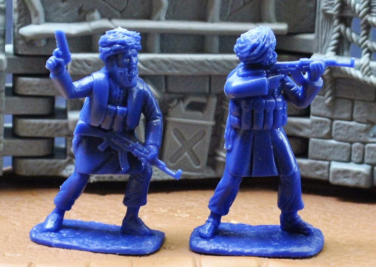 Modern Army Men: Armies in Plastic U.S. Marines and Taliban.