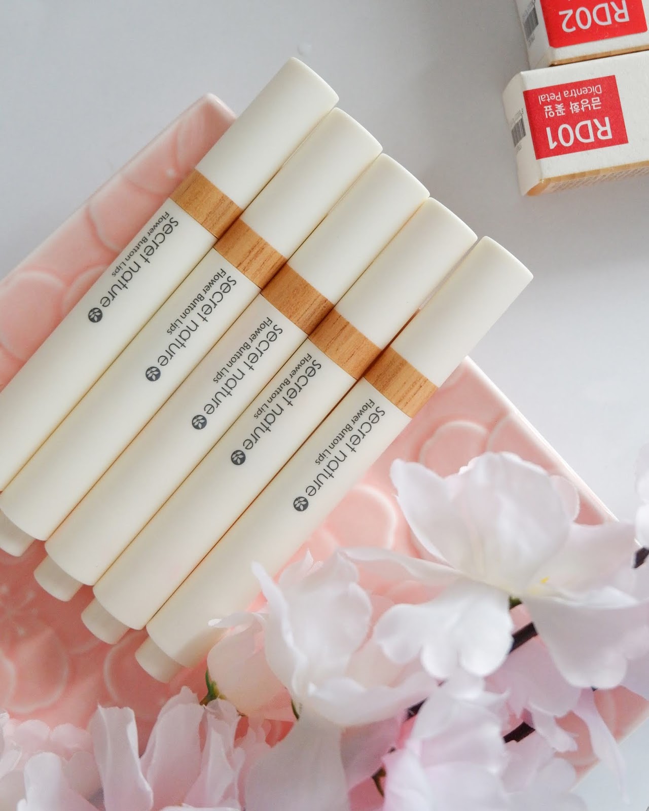 SECRET NATURE FLOWER BUTTON LIPS REVIEW: FLATTERING RED SHADES FOR ...