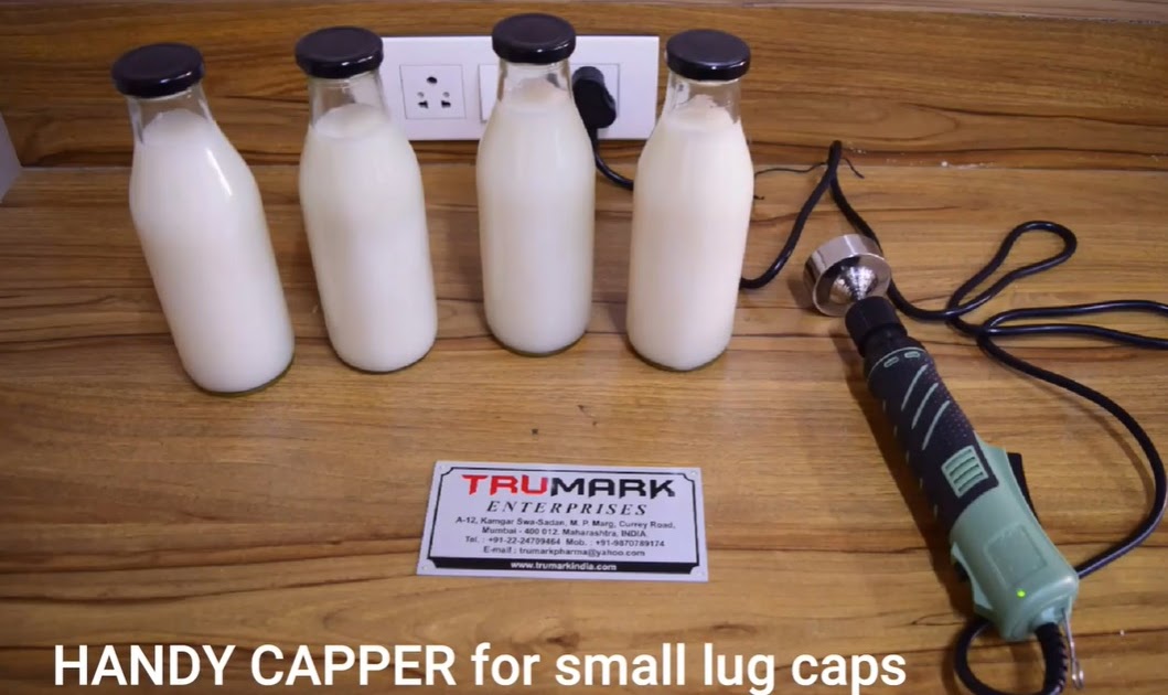 FILLING CAPPING LABELING MACHINES: Hand Capping Machine For Milk Bottles