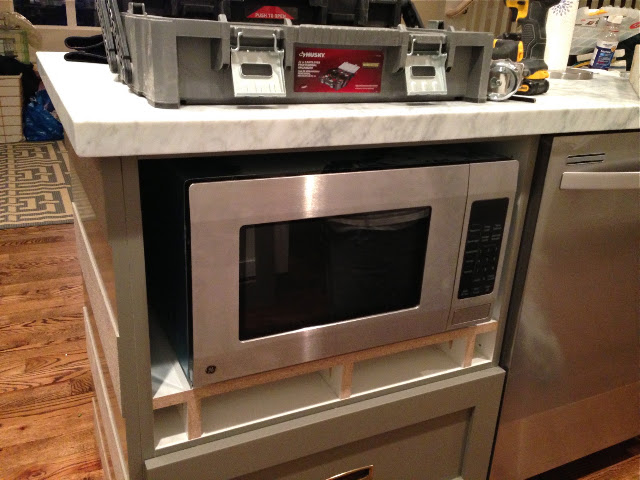 need a low-cost microwave - under-counter - 24" cabinet