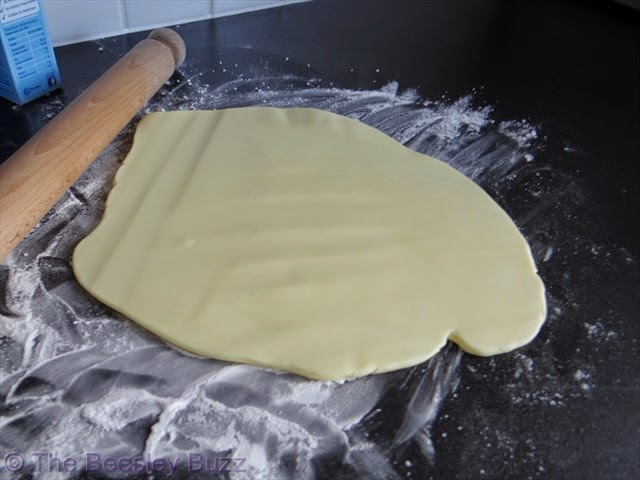 8. Trim off any excess from around the bottom of the dress with a knife ...