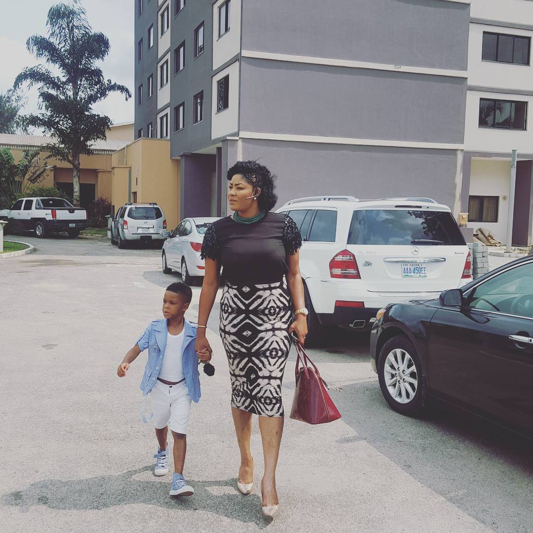 Actress Angela Okorie wore this black blouse and fitted skirt to church ...