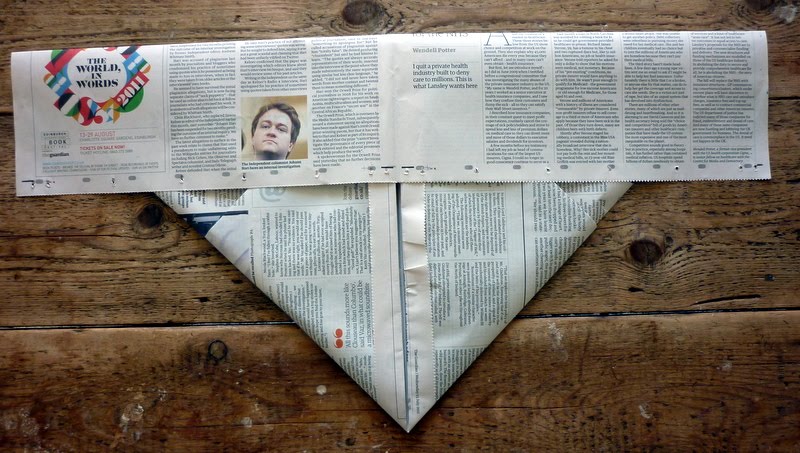 sixty one A: Recycled paper helmet