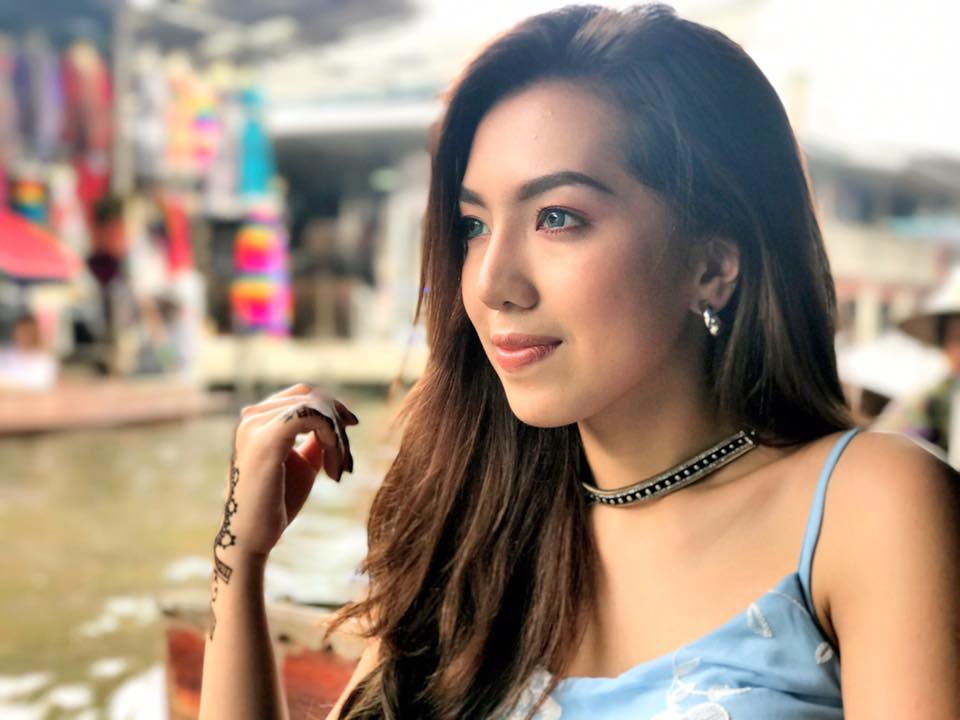 Warso Moe Oo is traveling at Damnoen Saduak Floating market in Thailand