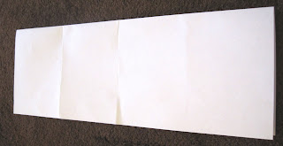 Changing Phase: Paper Buildings in Town