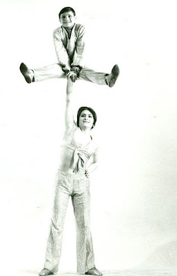 Black and White one arm lift ~ Women Lifting Men
