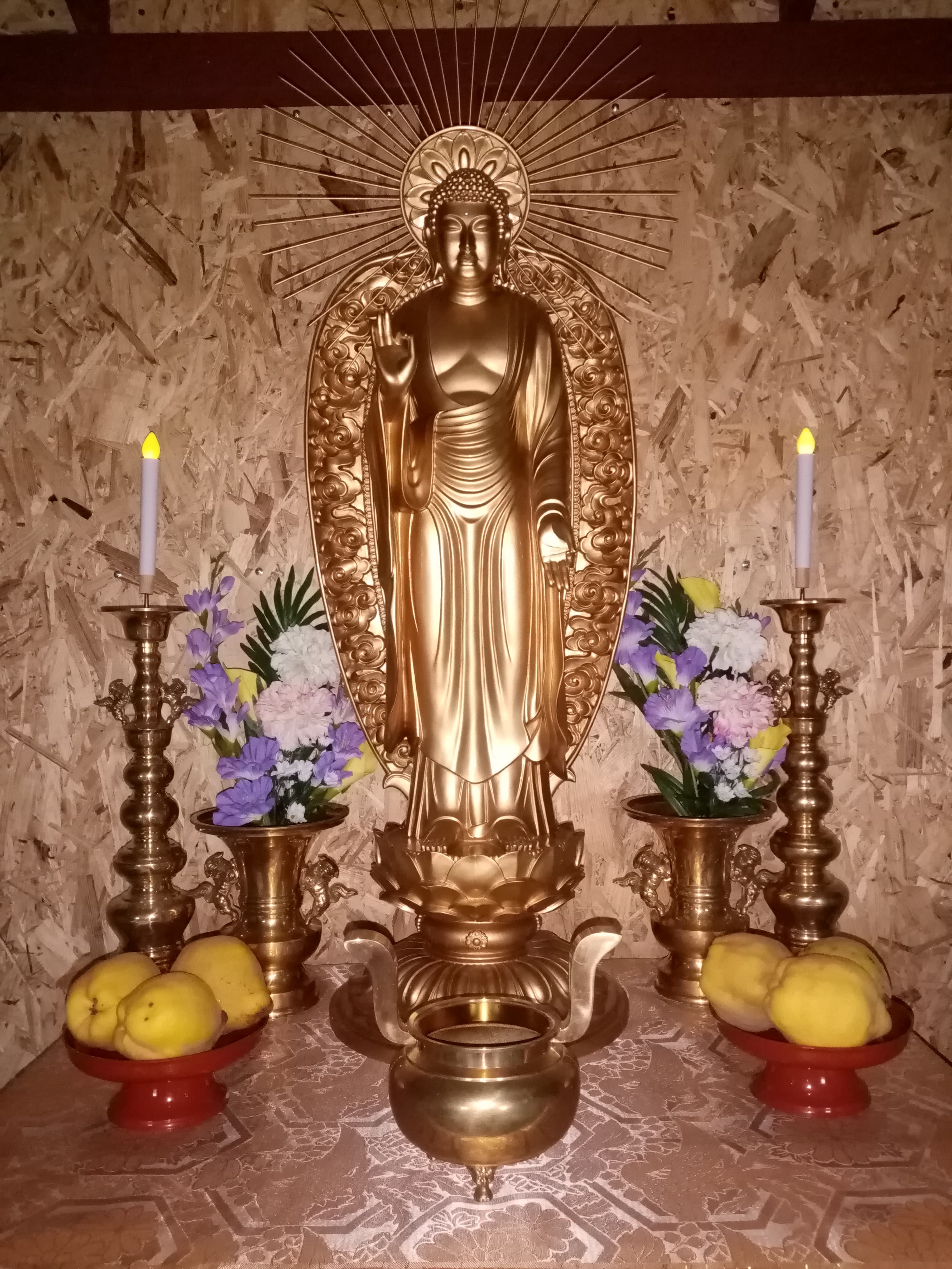 On the home altar (obutsudan) and making offerings to Amida Buddha ...