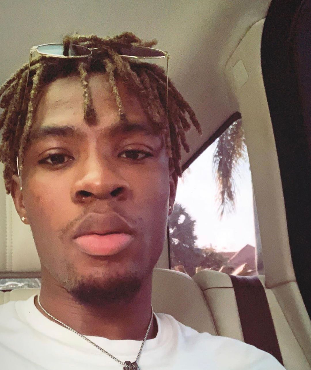 Photos of Joeboy Hairstyle