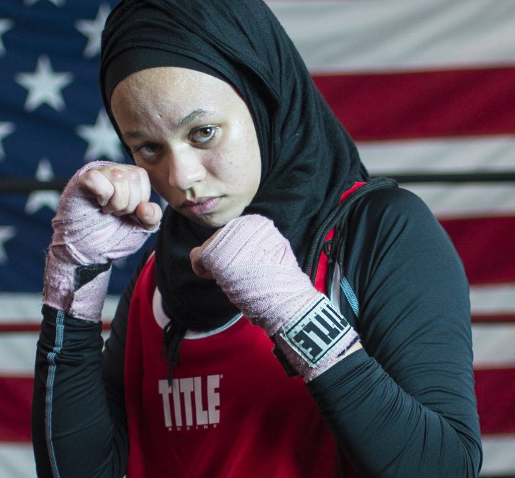 Alpha Omega Arts: Wearing a hijab, a young Muslim boxer enters the ring