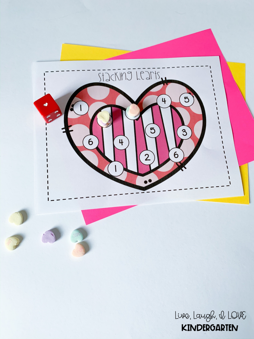 After we rolled, we used candy hearts and stacked them to match the number!