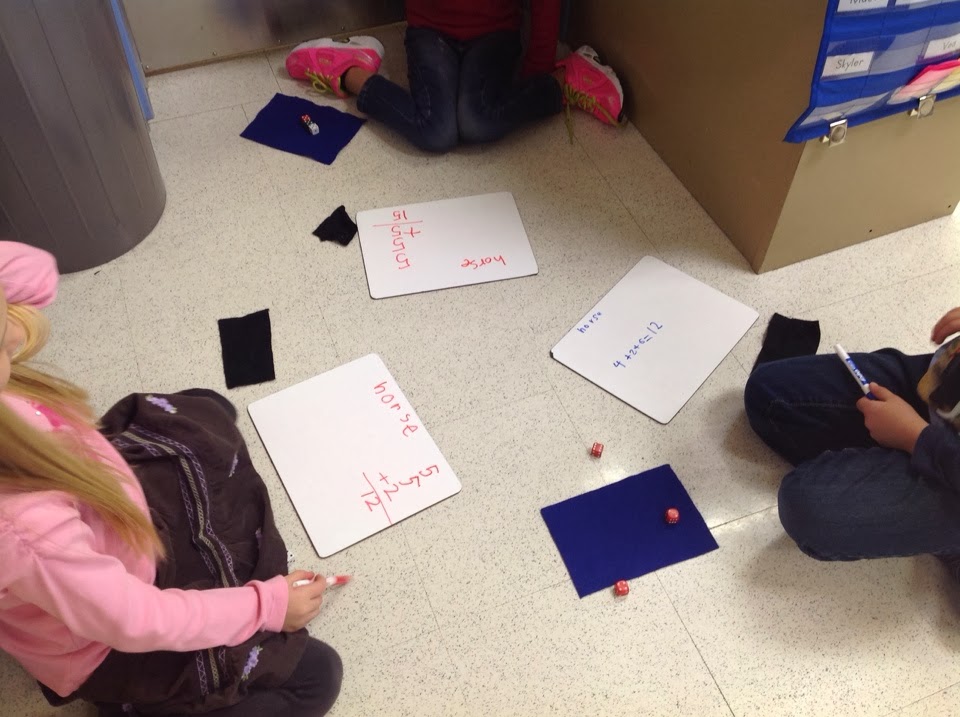 The First Grade Bloom Adding 3 Numbers Game the-first-grade-bloom-adding-3-numbers-game