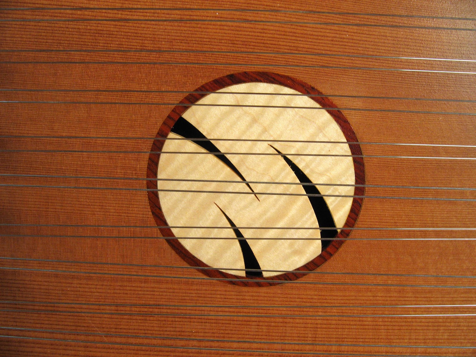 James Jones Instruments: Sound Hole Designs
