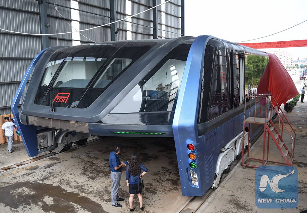 NEWS: Behold China's mega bus (that you can drive under!) | The Test Pit