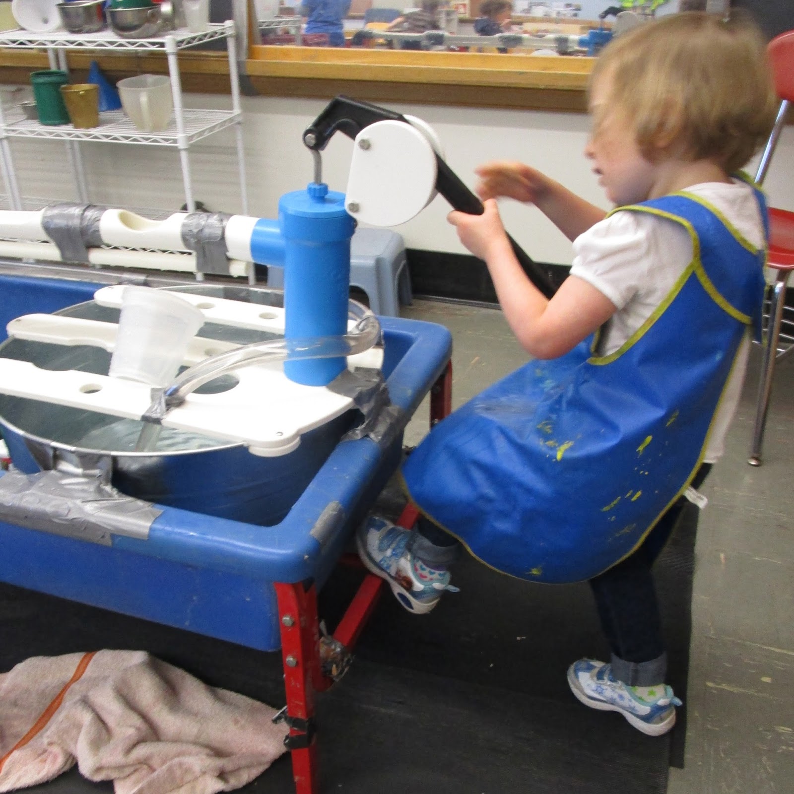 SAND AND WATER TABLES: HAND PUMP, A NARRATIVE