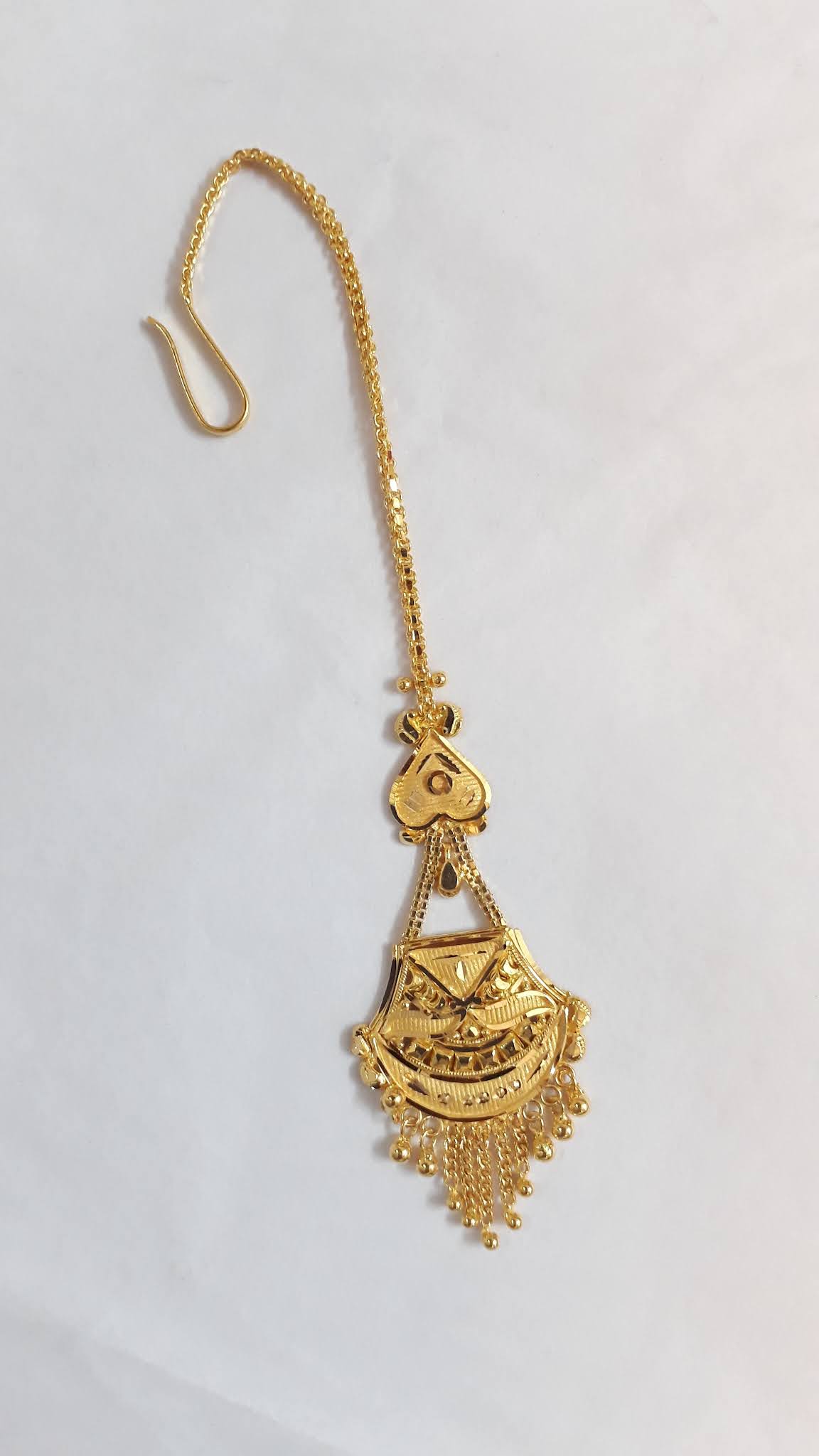 GOLD MAANG TIKKA DESIGNS