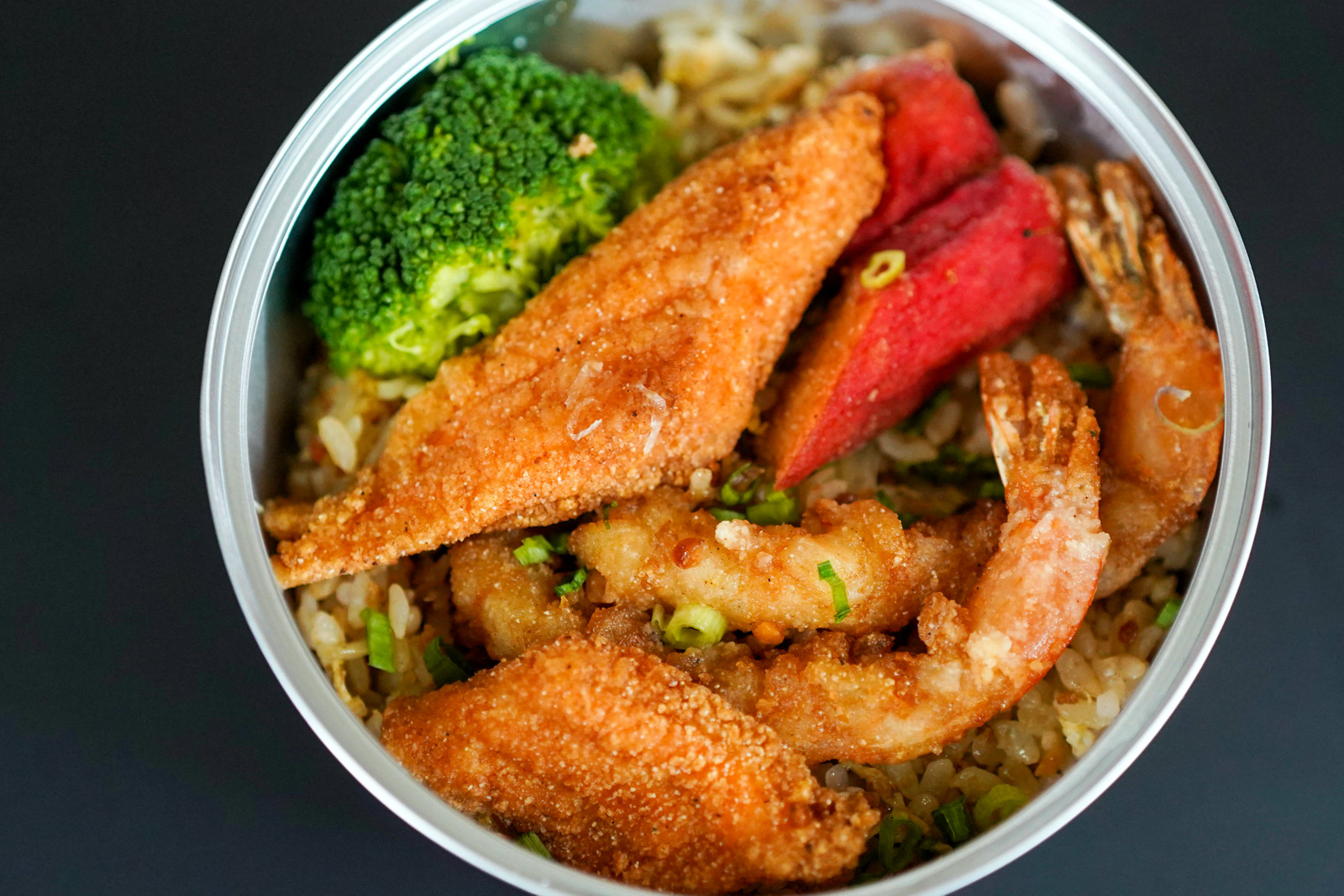 The Seafood Fried Rice surfaces with fairly fresh, fleshy fish, large ...