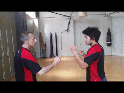 Using overhand inverted punch as simultaneous deflection