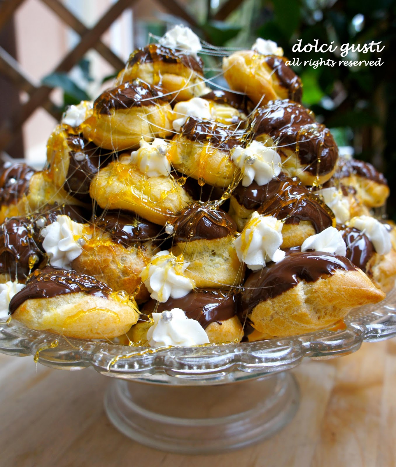 chocolate and cakes: profiteroles with chocolate, butter cream and ...