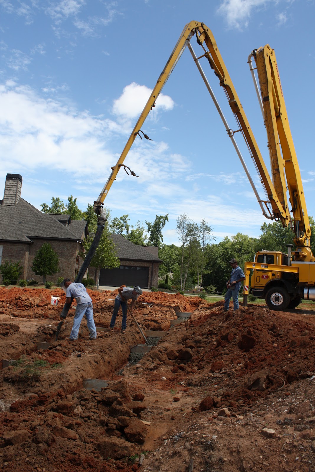 Home, Home on the Plains: Digging Footers and Pumping Concrete