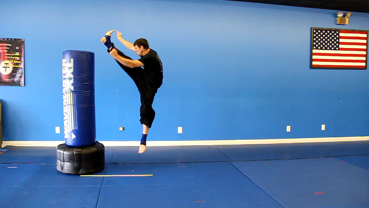John Eric Goff's Blog: Physics of a Jump Spin Reverse Crescent Kick
