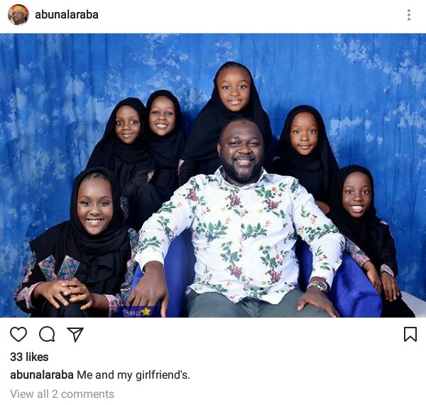 Photos of a Nigerian Muslim father with his six beautiful daughter