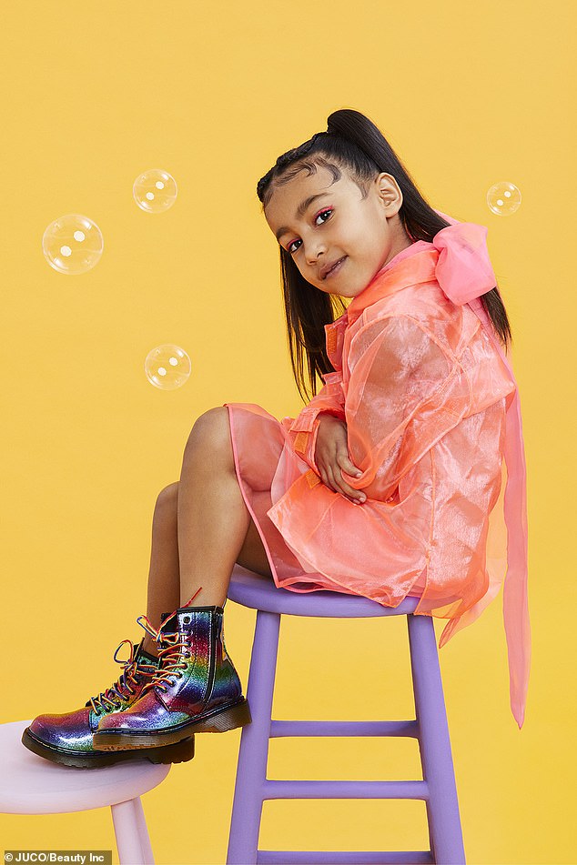 North West is praised for fashion sense and poses for first magazine shoot