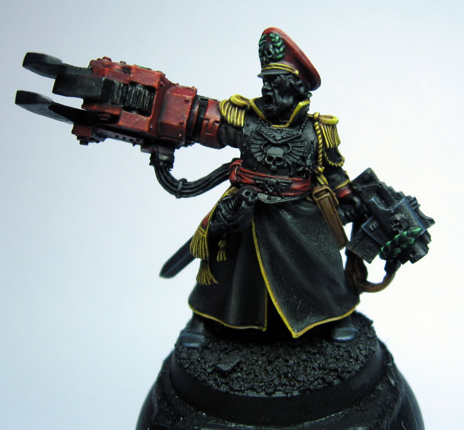 Burned Brush: Commissar Yarrick update - green areas and boots painted.