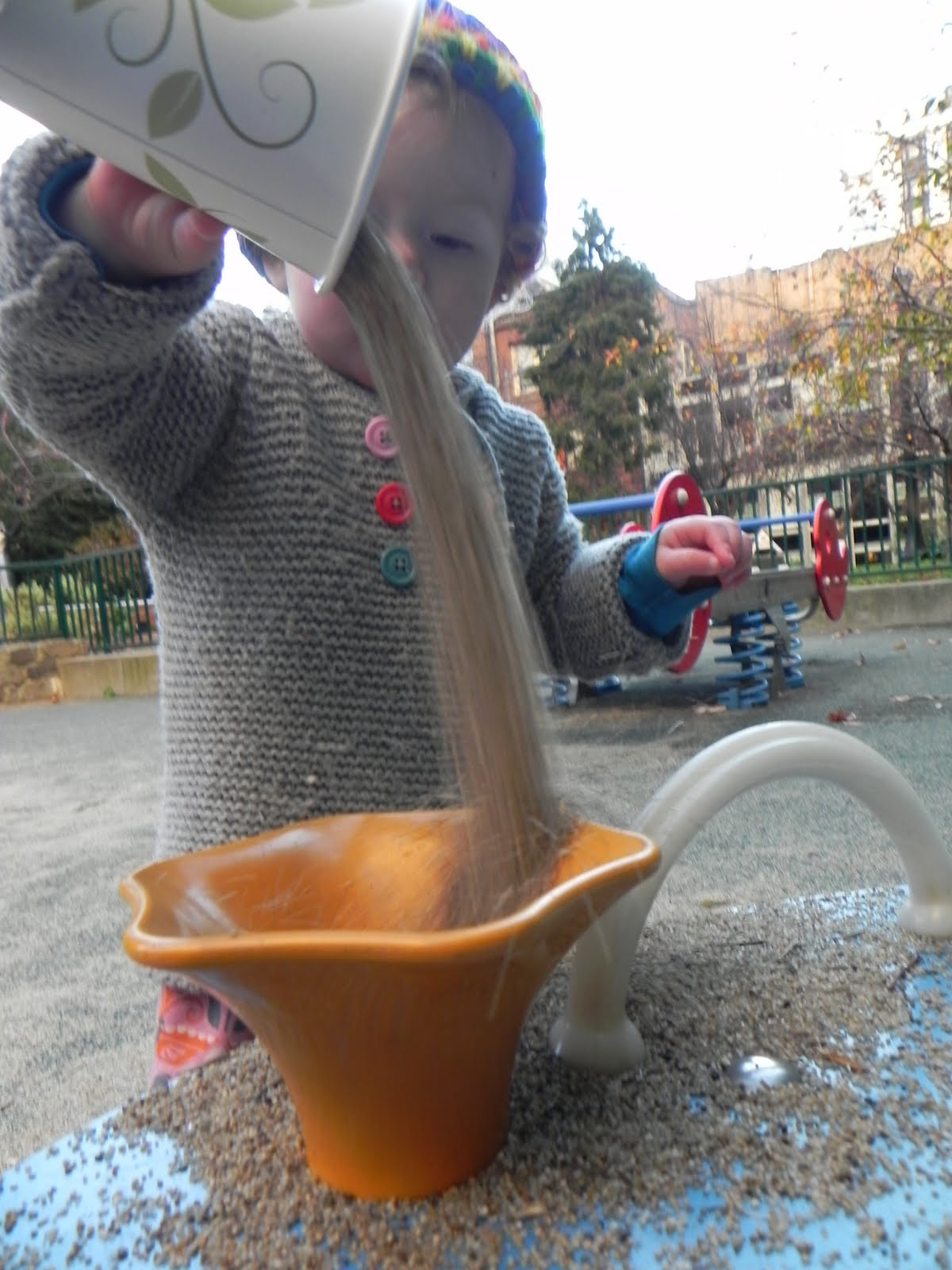 Spencer Alley: Sand-Pouring Baby