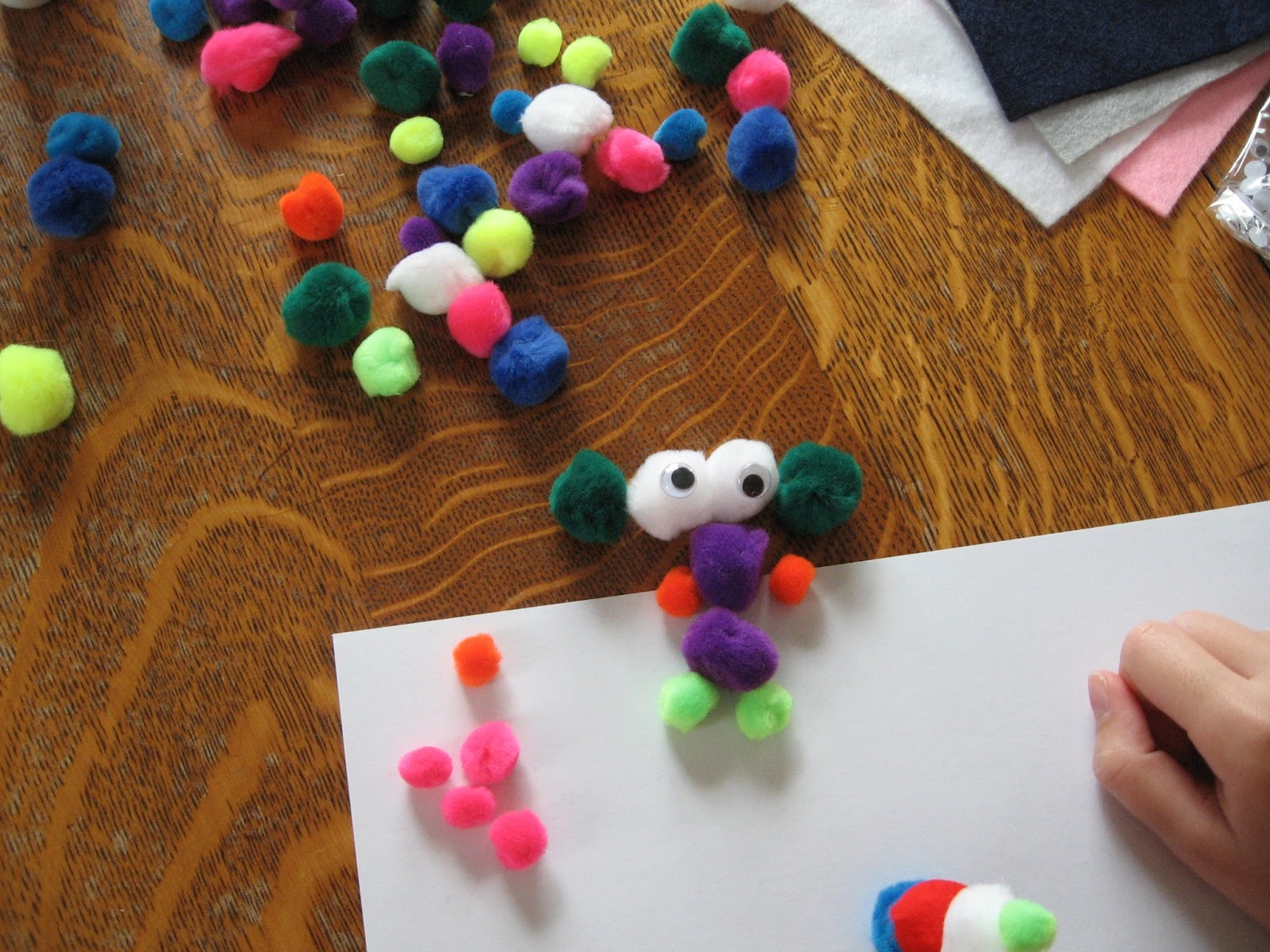 Almost Unschoolers: Summer Fun Day 5 - Pom-Pom Creatures