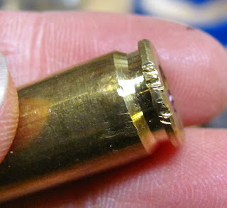 KCPMCGuild: Punch Caps from Shell Casings