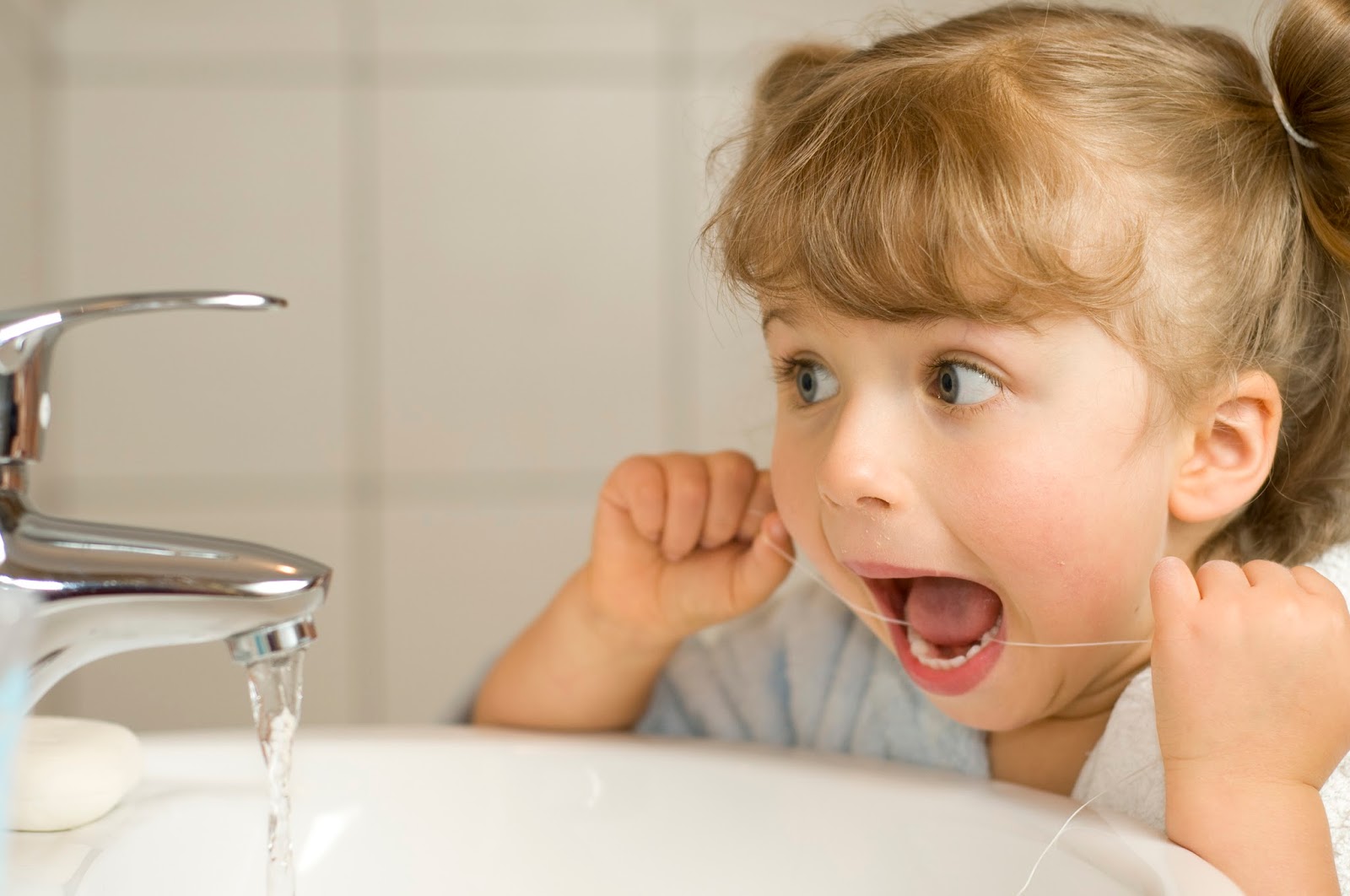 FAQs: Flossing For Kids – Pediatric Dentistry of Suffolk County