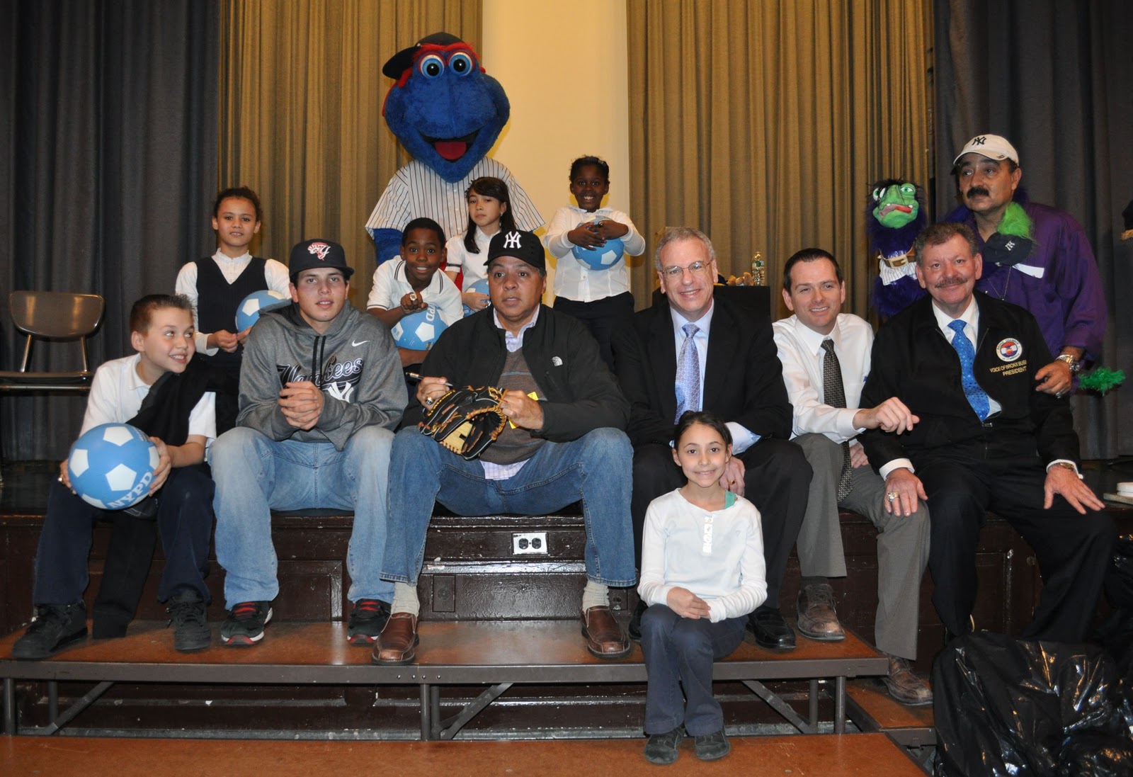 Bronx Press Politics: Newest Yankee helps give out toys at P.S. 7