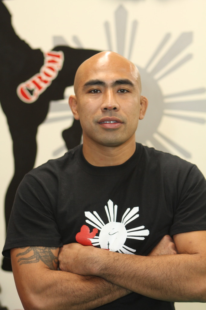 CROM Martial Training: Chris Romulo's Interview in Runner's World!