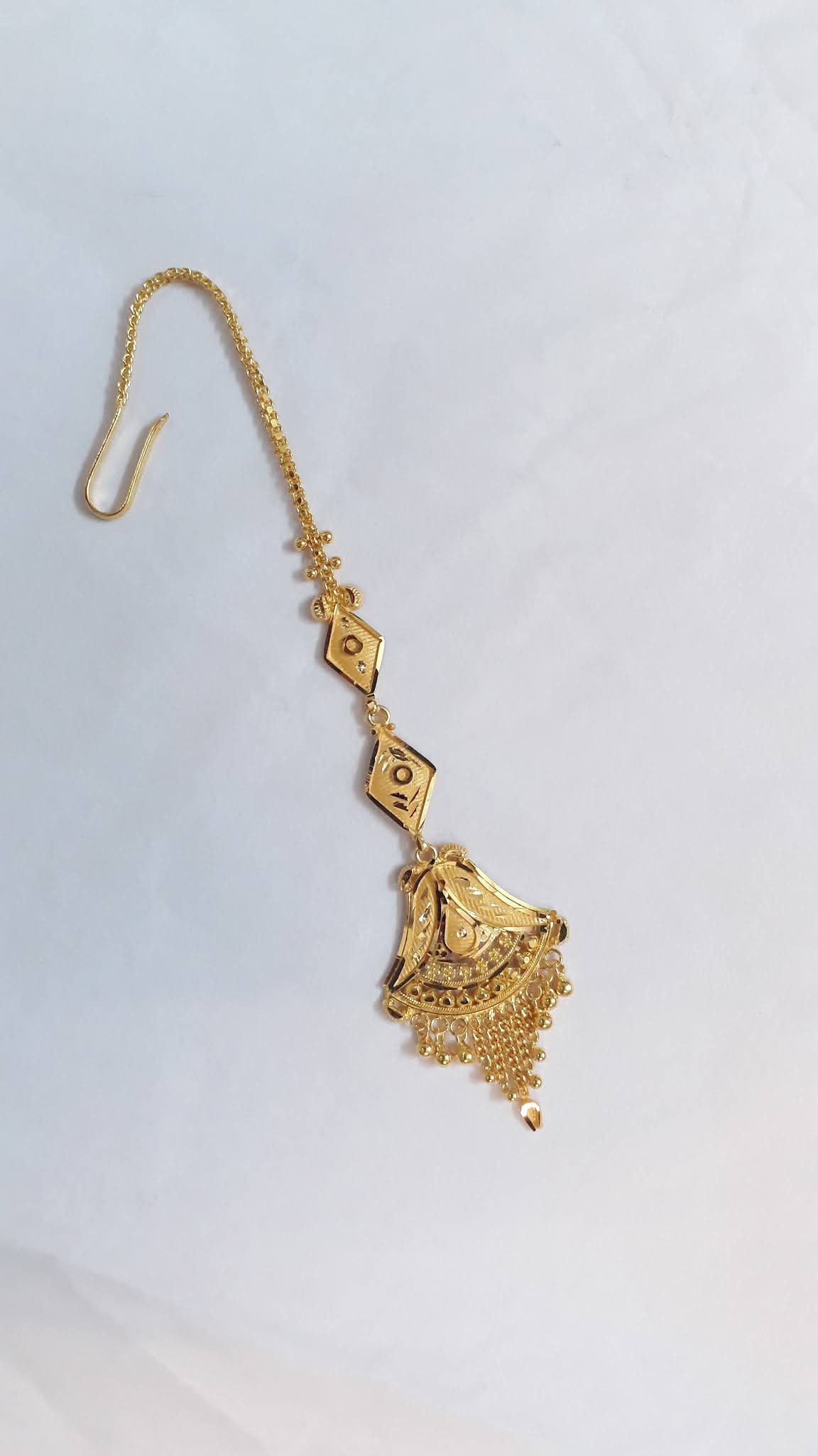 GOLD MAANG TIKKA DESIGNS