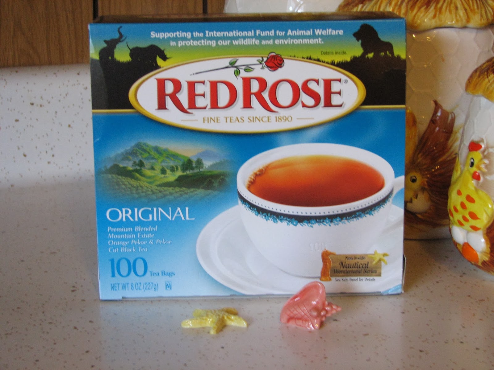 They Call This America: Red Rose tea figurines
