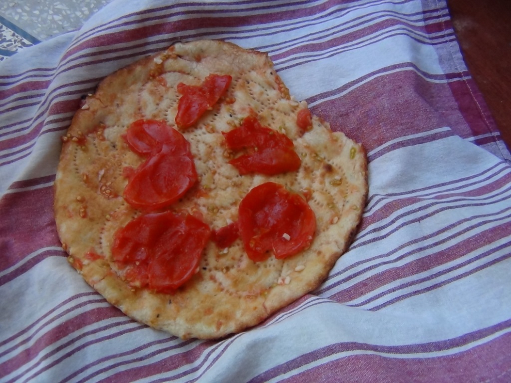 The Art of Uzbek Cuisine: Tandir non (Bread baked in a special clay oven)