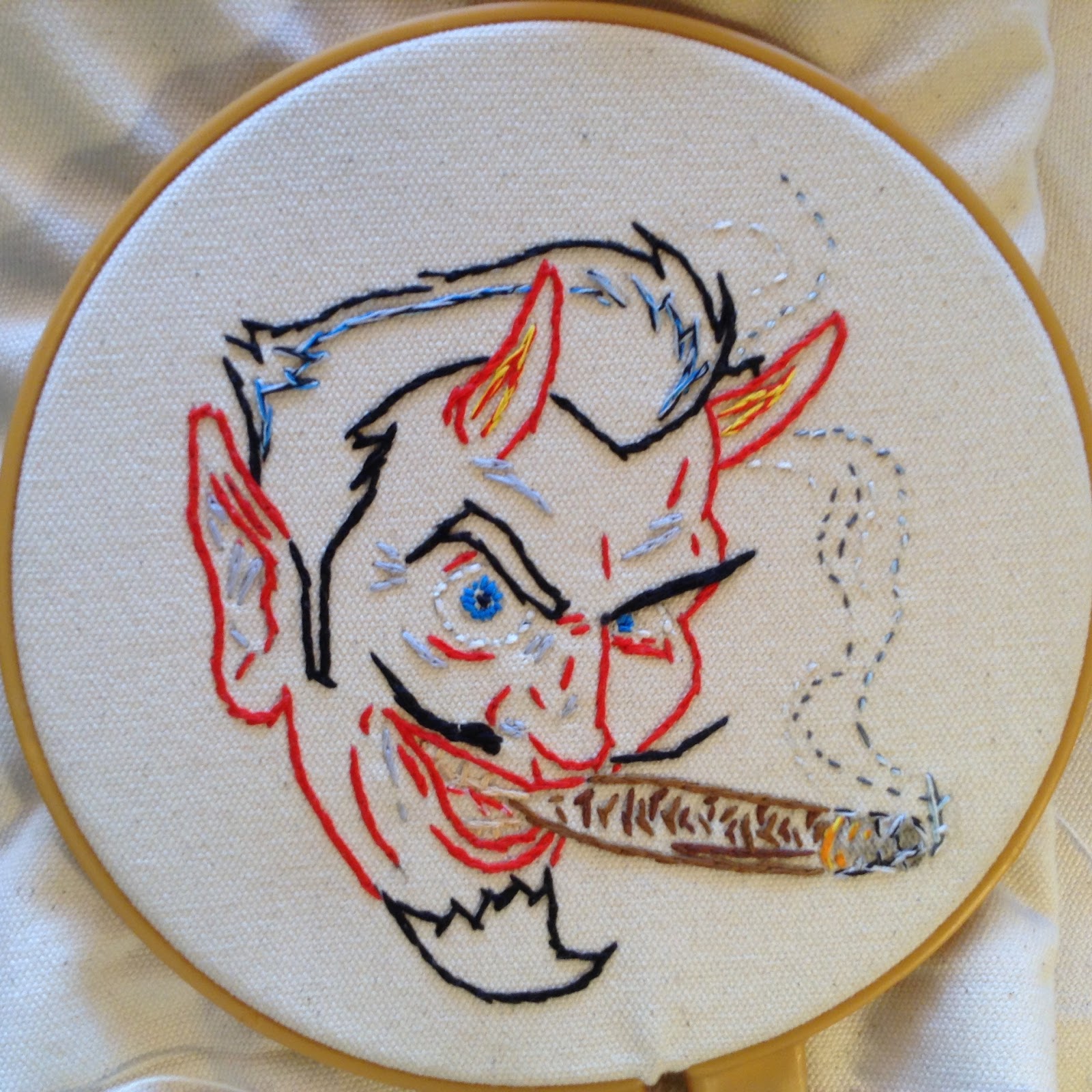 Dave's knot working: embroidered "Coop" devil head