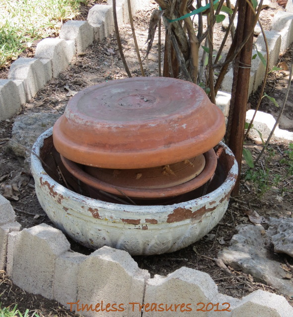Timeless Treasures: Stacked Clay Pots and Saucer Pedestal Planter and ...