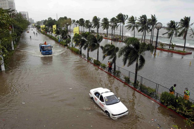 Storm surge leads to floods. (Typhoon GENER ~ International name ...