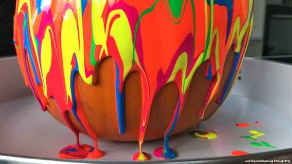Learning and Exploring Through Play: Carve Free Neon Painted Pumpkins