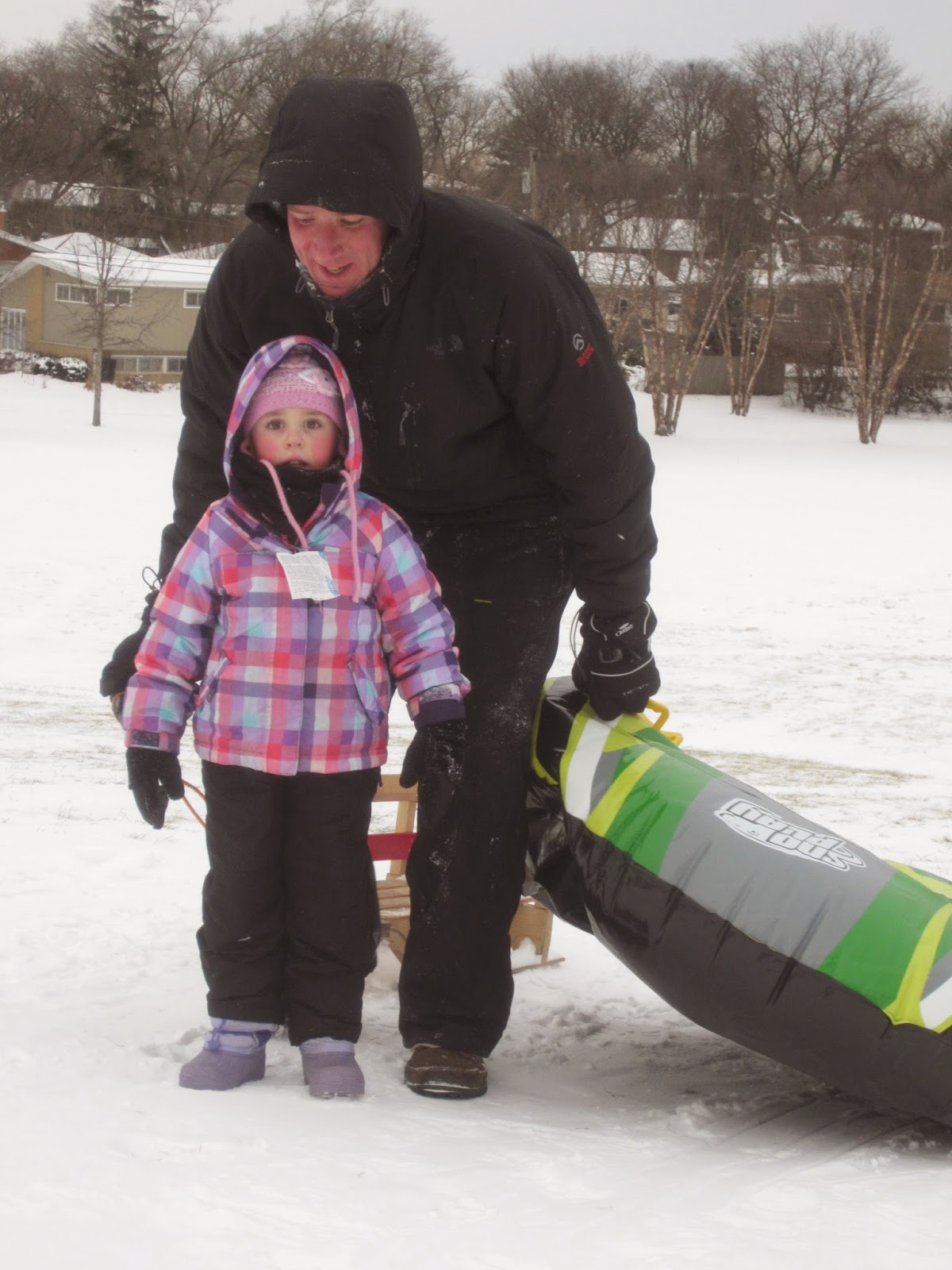 Healy Family Fun: Sledding on Grass