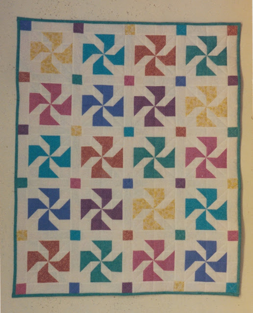 Julie's Quilts and Costumes: Throwback Thursday--Pinwheel Baby Quilt