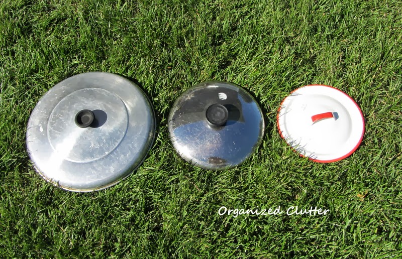 A Repurposed Pot Lid Snowman - Organized Clutter