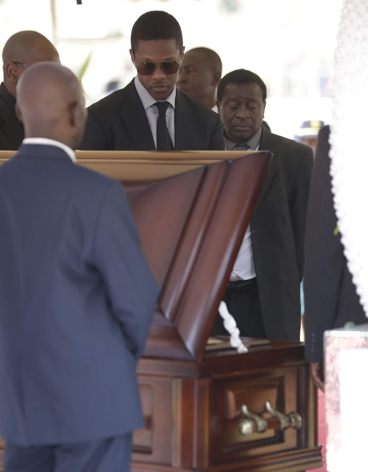 Pictures: Robert Mugabe Jnr. Pays Last Respects During Body Viewing!