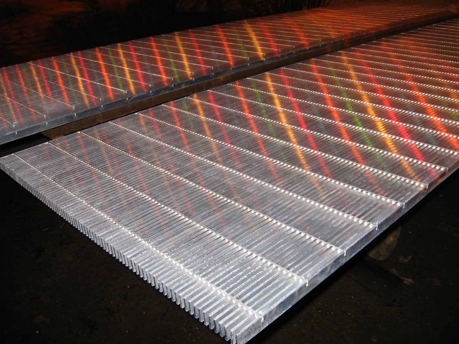 HEAVY METAL WORKS: Metal Walk Off Mat -Whidbey Telecom Main Entry