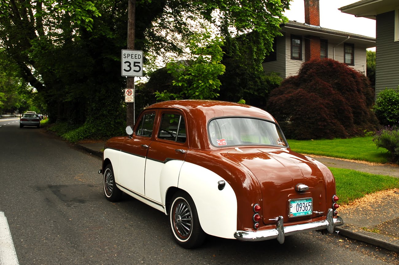OLD PARKED CARS.: 1958 Triumph TR-10.
